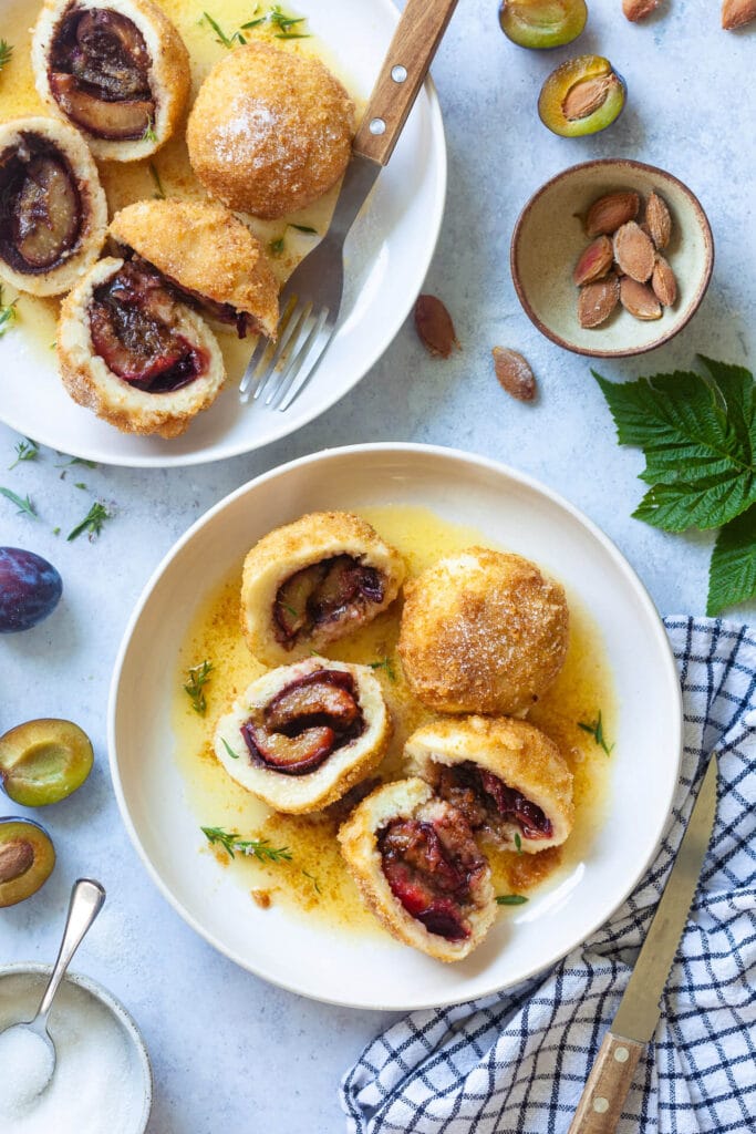 Cinnamon Plum Dumplings with Butter Breadcrumbs - Vibrant plate