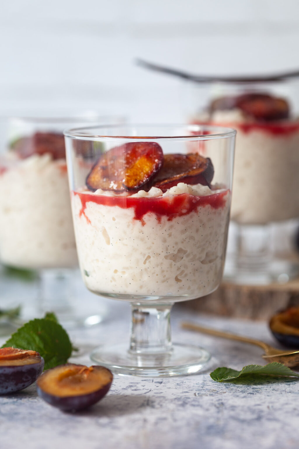 Rice Pudding with Baked Plums - Vibrant plate